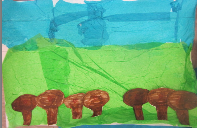 Making landscape pictures with tissue paper for backgrounds